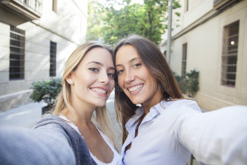Friends Making Selfie Two Beautiful Young Women Making Selfie Stock