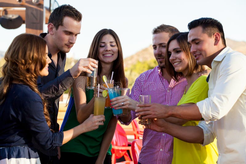 Friends Making a Toast at a Bar Stock Photo - Image of handsome, social ...