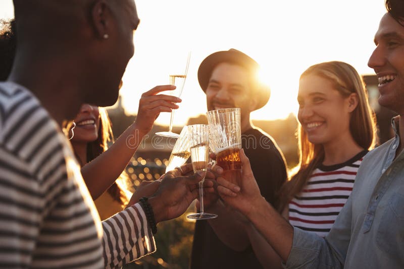 Friends Making a Toast at a Rooftop Party, Close Up Stock Photo - Image ...