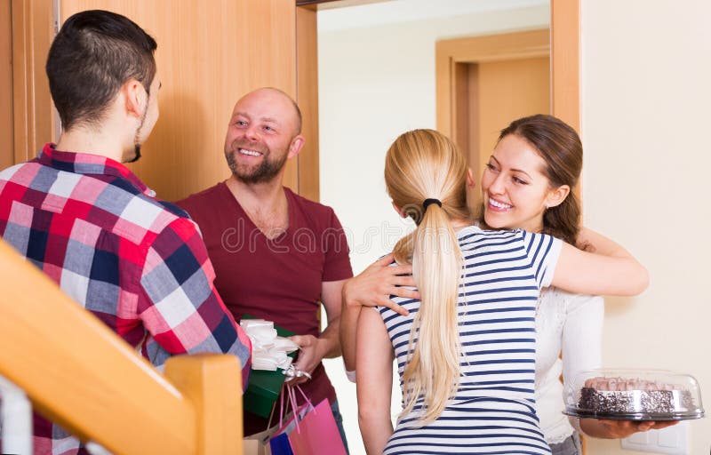 Warm Meeting of Casual Friends Stock Photo - Image of casual, home ...