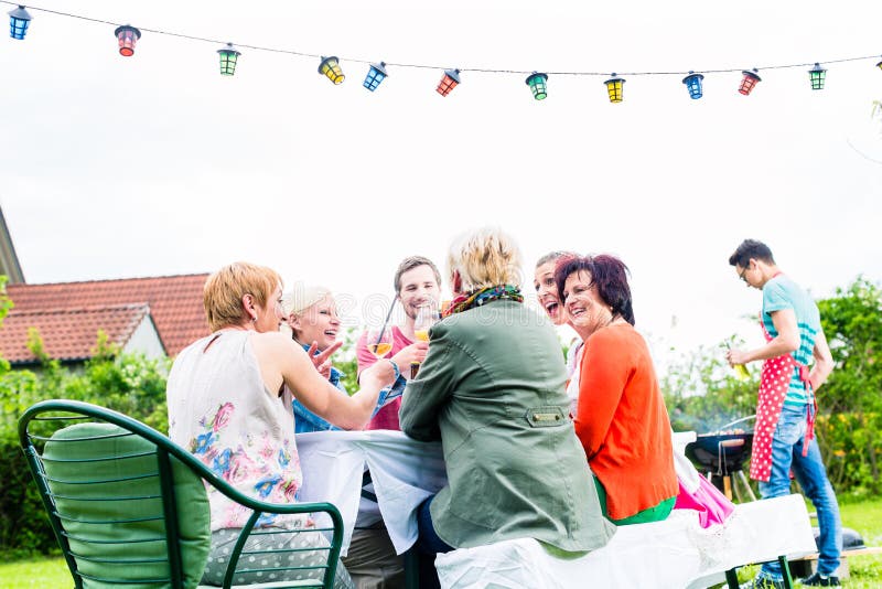 Friends and Neighbors on Long Table Celebrating Party Stock Photo ...