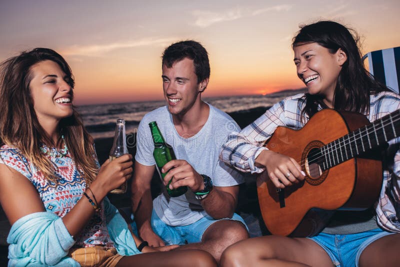 Friends Partying on the Beach with Drinks Stock Photo - Image of people ...