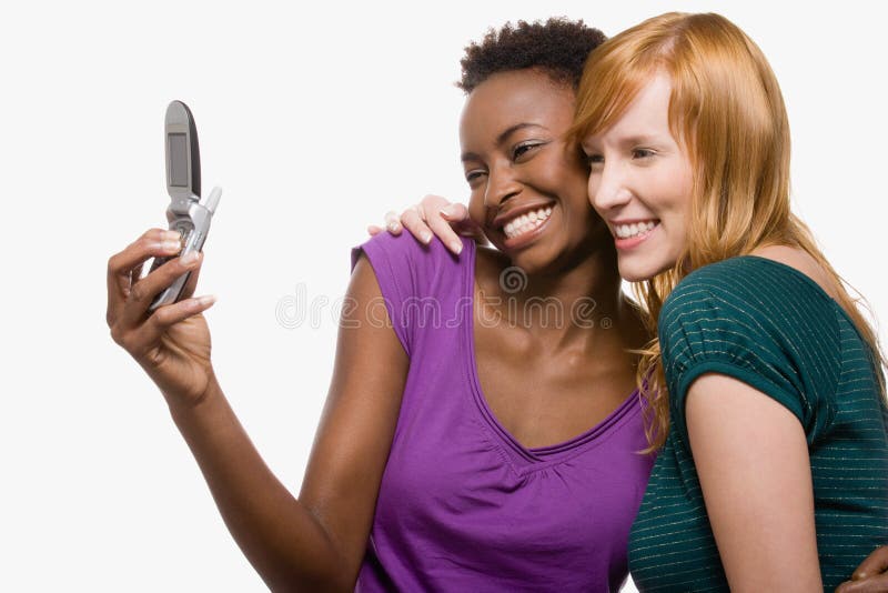 Friends Photographing Themselves with Cell Phone Stock Image - Image of ...