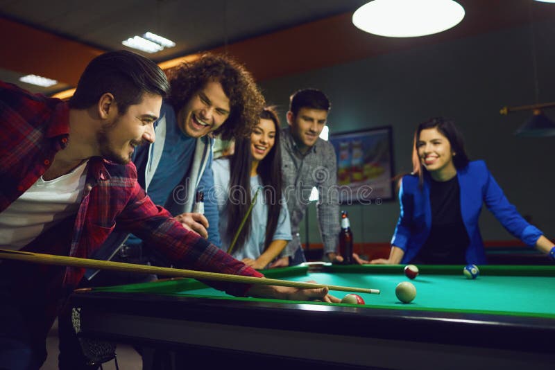 Friends Play Billiards in Bar. Stock Photo - Image of pool, billiards ...