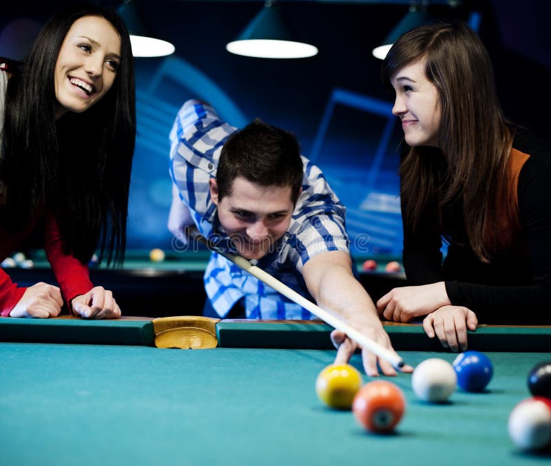 Friends playing billiard stock image. Image of holding - 29192497