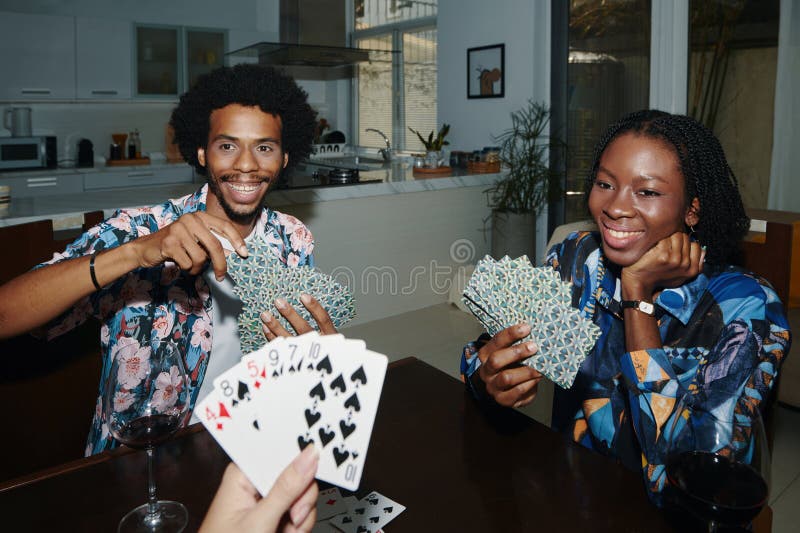 Friends Playing Cards at Home Stock Photo - Image of people, happy ...