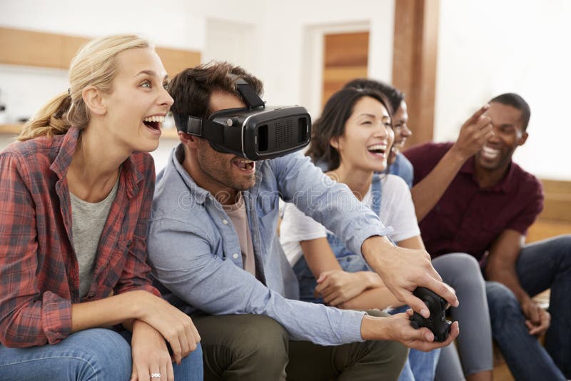 Friends Playing Computer Game with Virtual Reality Headset Stock Image ...