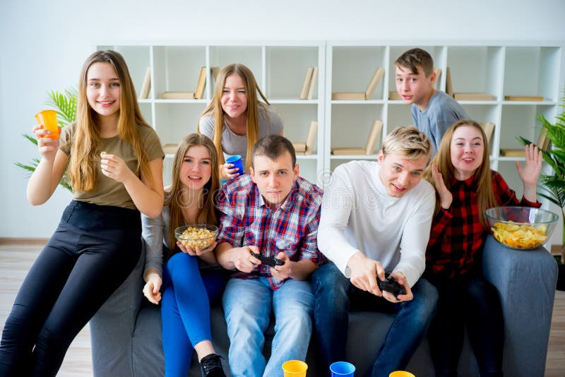 Friends Playing a Console Game Stock Image - Image of happy, control ...