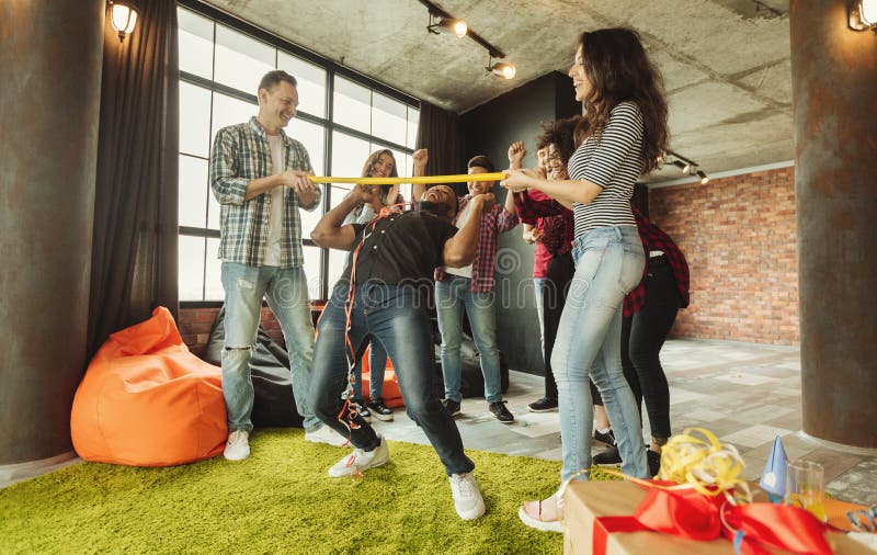 Friends playing limbo stock photo. Image of game, female - 136617384