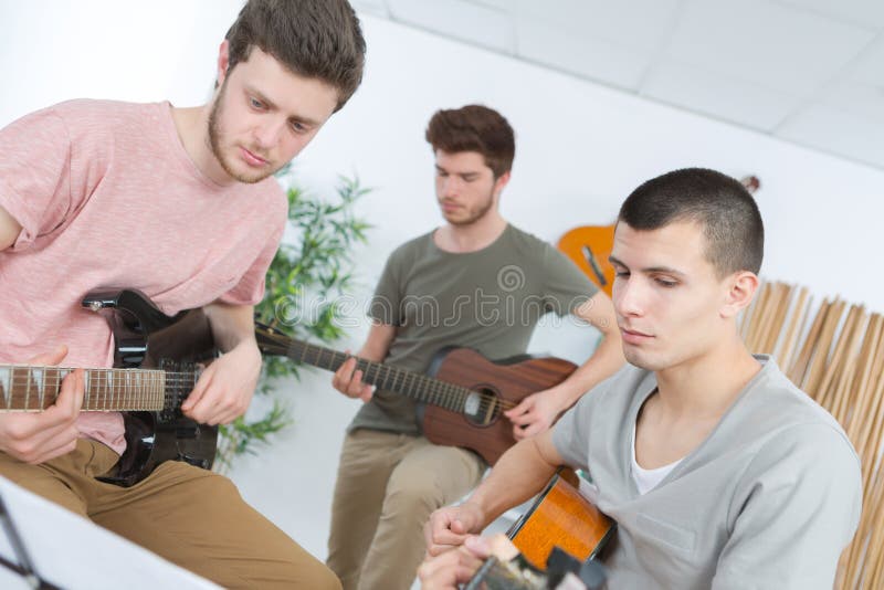 Friends playing music stock image. Image of rock, sound - 243559709