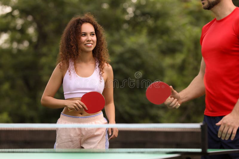 Friends Playing Ping Pong Outdoors on Summer Day Stock Photo - Image of ...