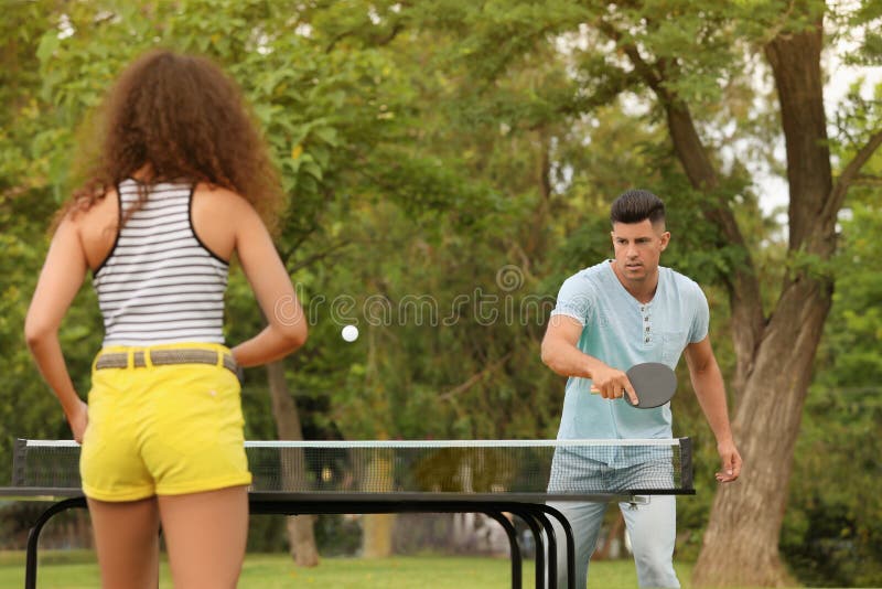 Friends Playing Ping Pong Outdoors on Summer Day Stock Image - Image of ...
