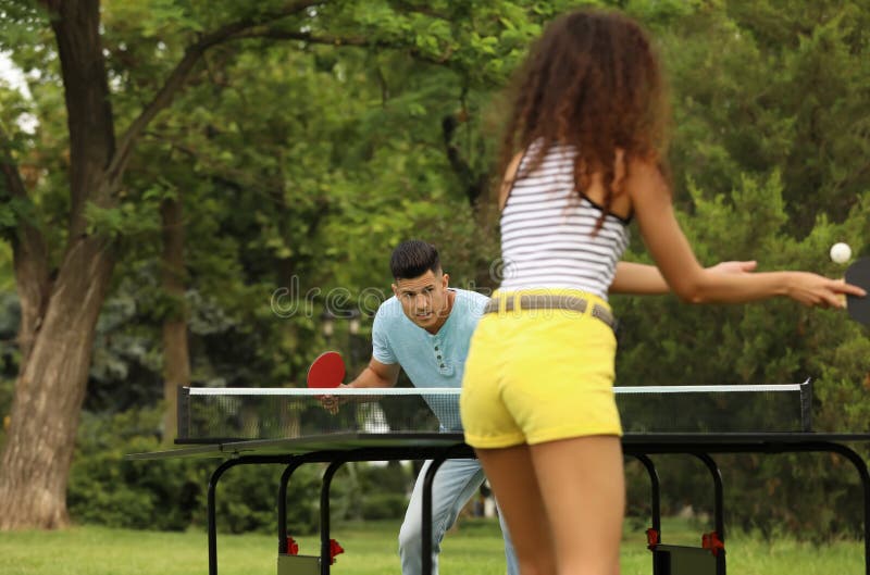 Friends Playing Ping Pong Outdoors on Summer Day Stock Photo - Image of ...