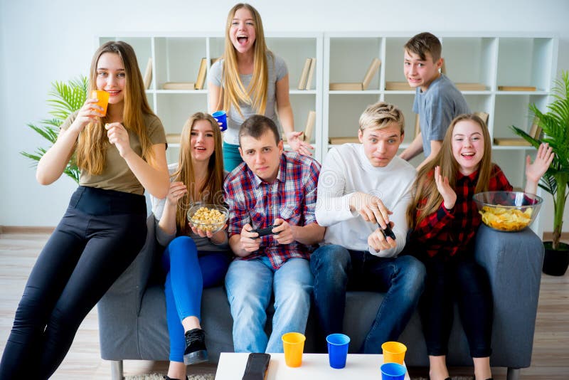 Friends Playing Playstation Stock Image - Image of console, game: 90364593