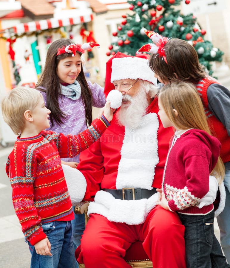 Friends Playing with Santa Claus Stock Image - Image of house, playful ...