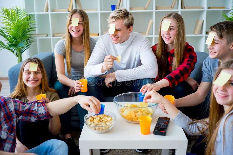 Friends playing stickers stock image. Image of happy - 90364985