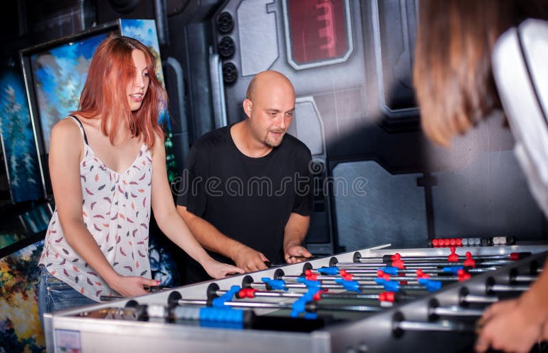 Friends Playing Table Foosball Stock Image - Image of fooseball ...