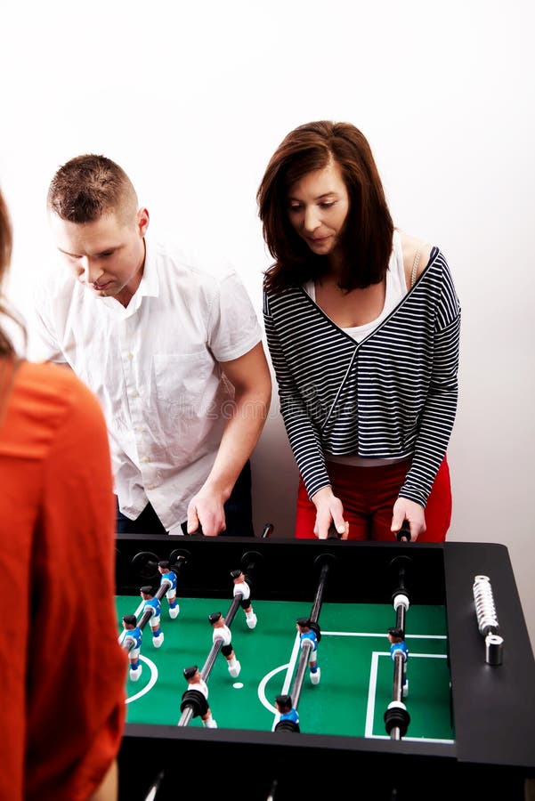 Friends Playing Table Football. Stock Photo - Image of home, funny ...