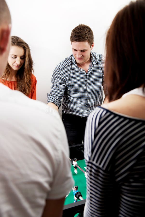 Friends Playing Table Football. Stock Photo - Image of funny, friends ...