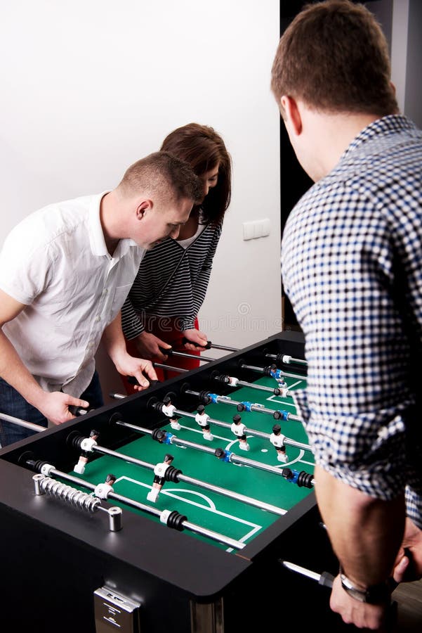 Friends Playing Table Football. Stock Image - Image of friends, couple ...