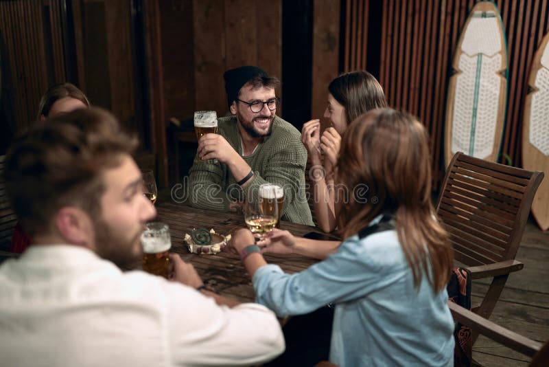 Friends in a Pleasant Talk in the Bar on the Lake Stock Image - Image ...