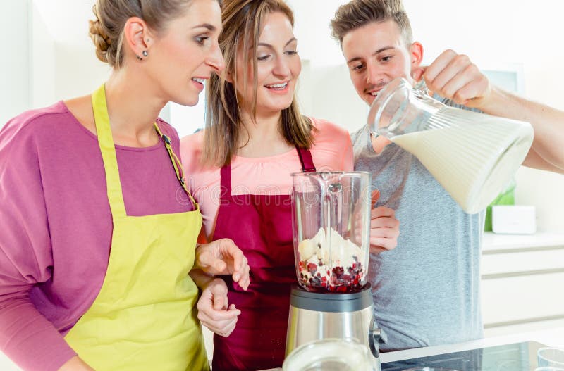 Friends Preparing Fresh Smoothie Stock Image - Image of juicer ...