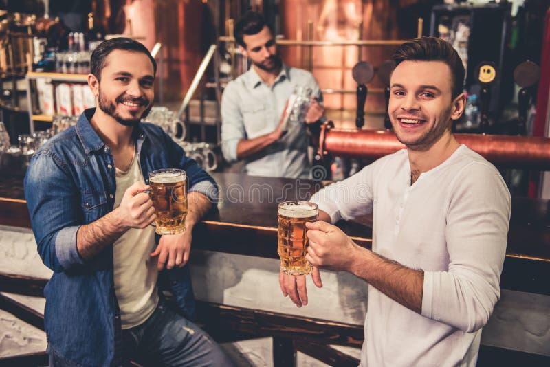 Friends in pub stock image. Image of indoors, party, hold - 89533841