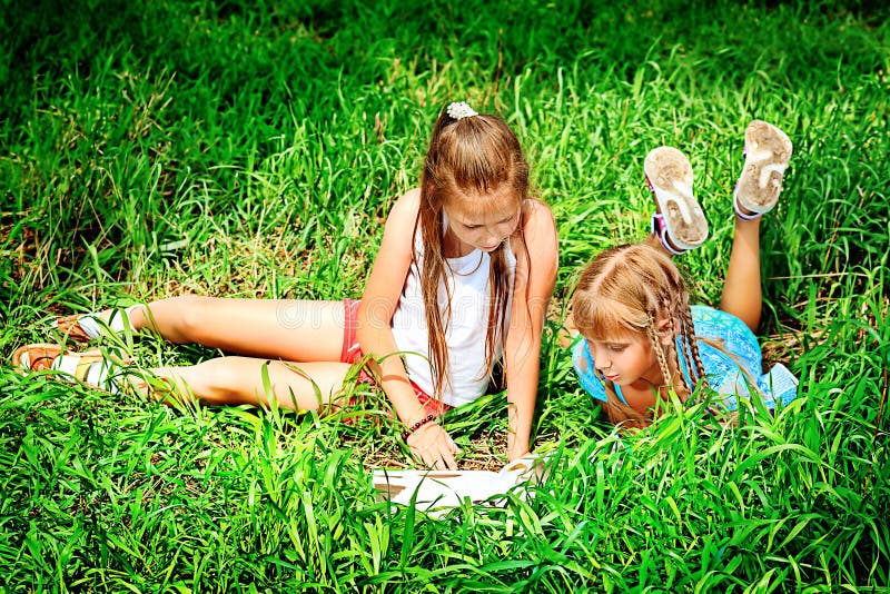 Friends reading stock photo. Image of faces, outdoors - 22994198