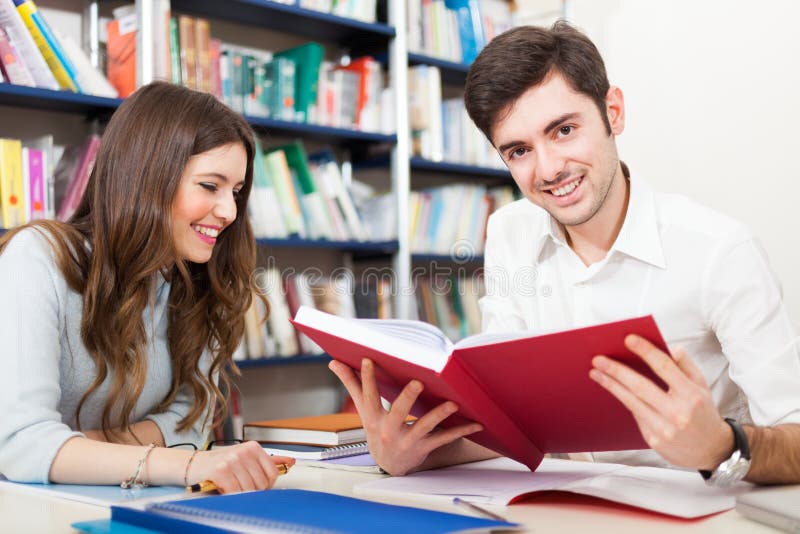 Friends reading a book stock image. Image of graduate - 30543903