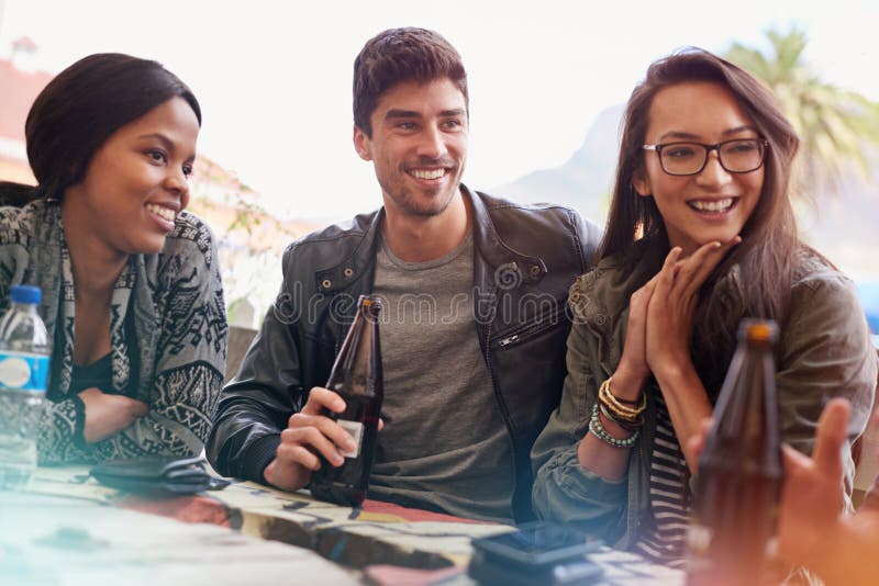Friends always Ready To Listen. a Group of Friends Drinking Outdoors ...