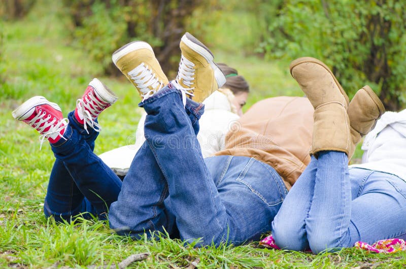 Friends Relaxing in the Forest Stock Image - Image of outdoors, friends ...