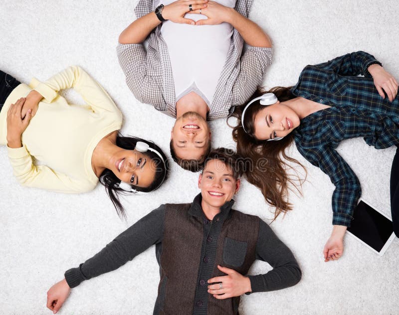 Friends Relaxing with Gadgets Stock Photo - Image of multiracial ...