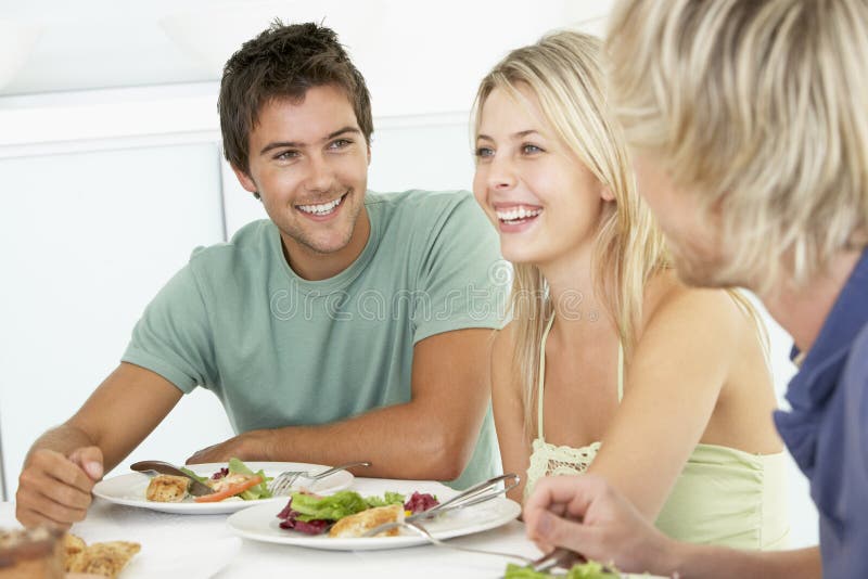 Friends Relaxing at Home Having Lunch Stock Image - Image of people ...