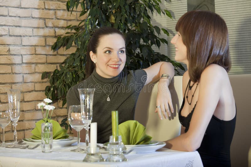 Friends in restaurant stock image. Image of friendship - 11329591