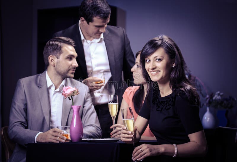 Friends in a restaurant stock image. Image of people - 31603407