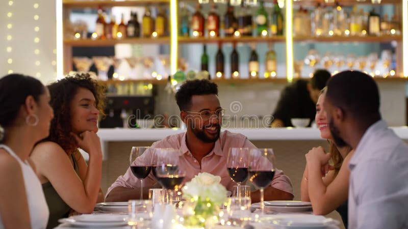 Friends in Restaurant with Wine, Speech and Cheers at Table Together ...