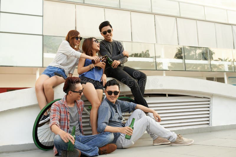 Friends resting outdoors stock image. Image of bottle - 69033737