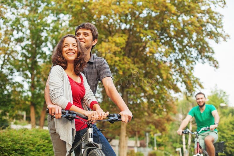 Friends riding bikes stock image. Image of brother, forest - 61055561