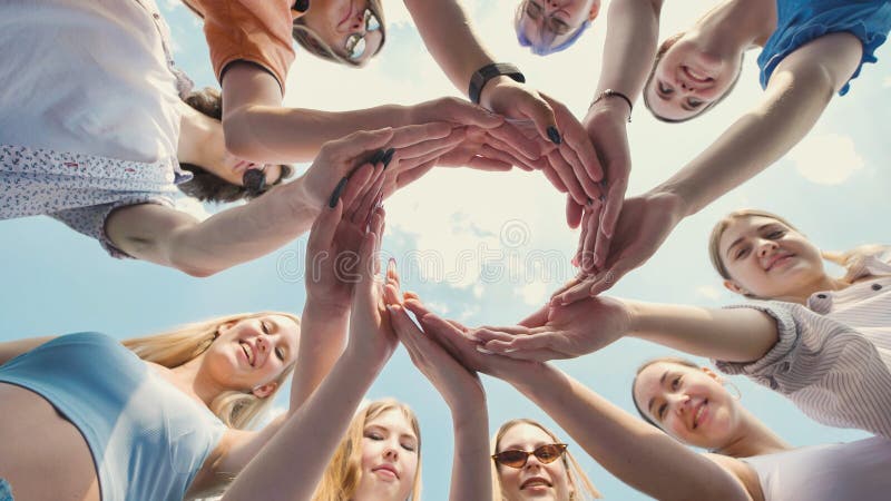 Friends at School Joining Hands in a Circle, Representing Unity ...