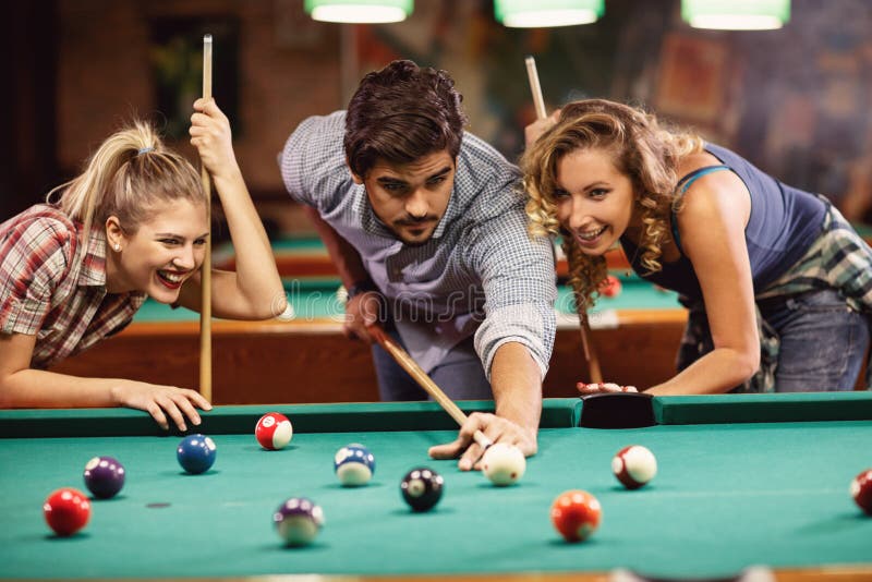 Friends Shooting Pool Ball Playing Snooker Together Stock Photo - Image ...