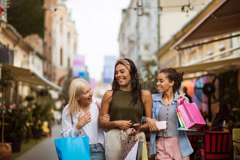 Friends in the shopping stock image. Image of fashion - 216130757