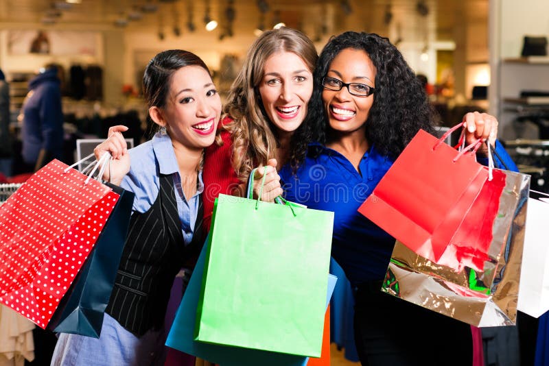 Friends Shopping with Presents in Mall Stock Photo - Image of bags ...