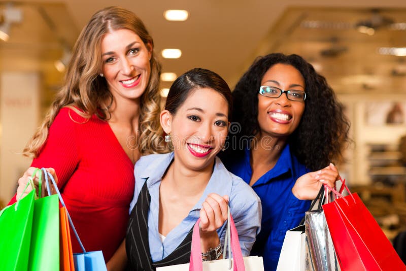 Friends Shopping with Presents in Mall Stock Photo - Image of caucasian ...