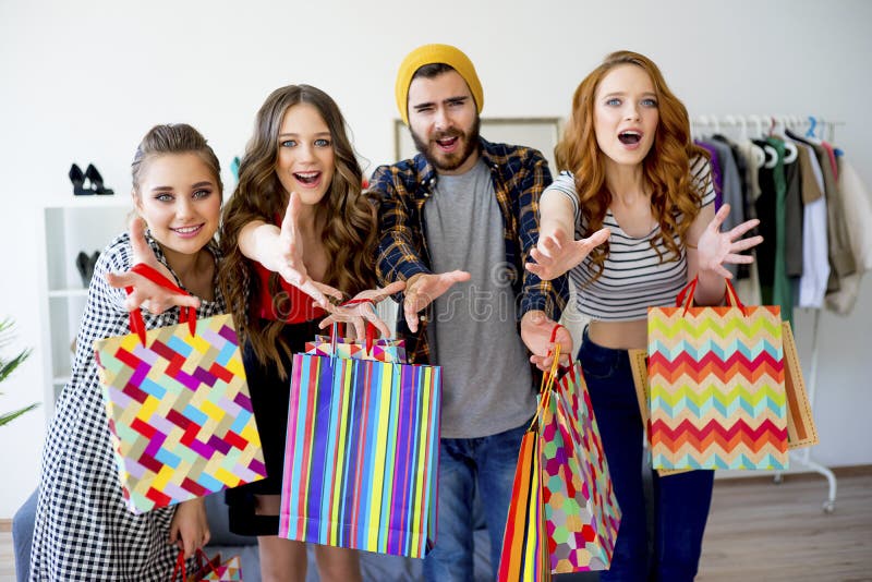 Friends shopping together stock image. Image of clothing - 98088859