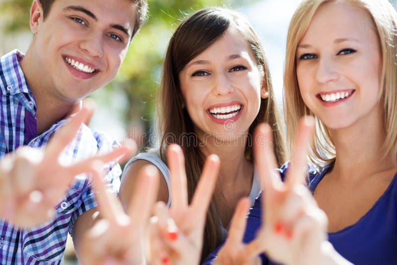 Friends point to sky look! stock image. Image of discovery - 2577619