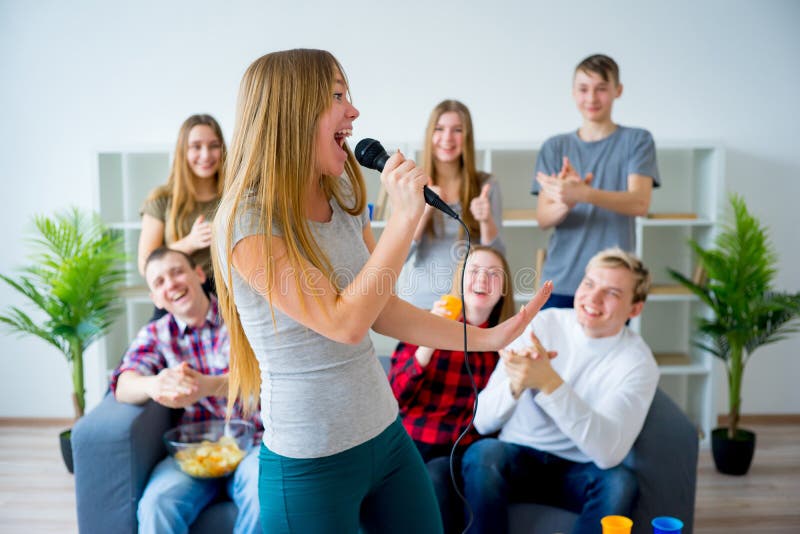 Friends Singing a Song Together Stock Photo - Image of game, people ...