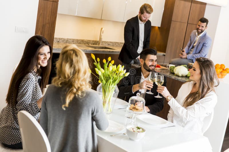 Friends Sitting at a Dining Table Stock Image - Image of wine, dinner ...