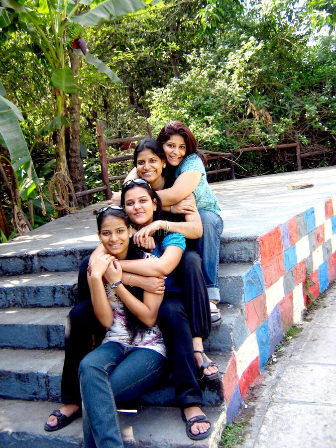 Friends sitting on steps stock image. Image of outdoor - 8328777