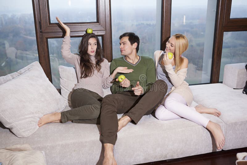 Friends Sitting Together on the Sofa Stock Photo - Image of happiness ...