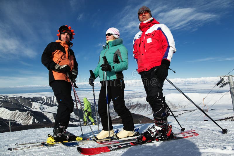 Friends at the ski resort stock image. Image of recreational - 18129783